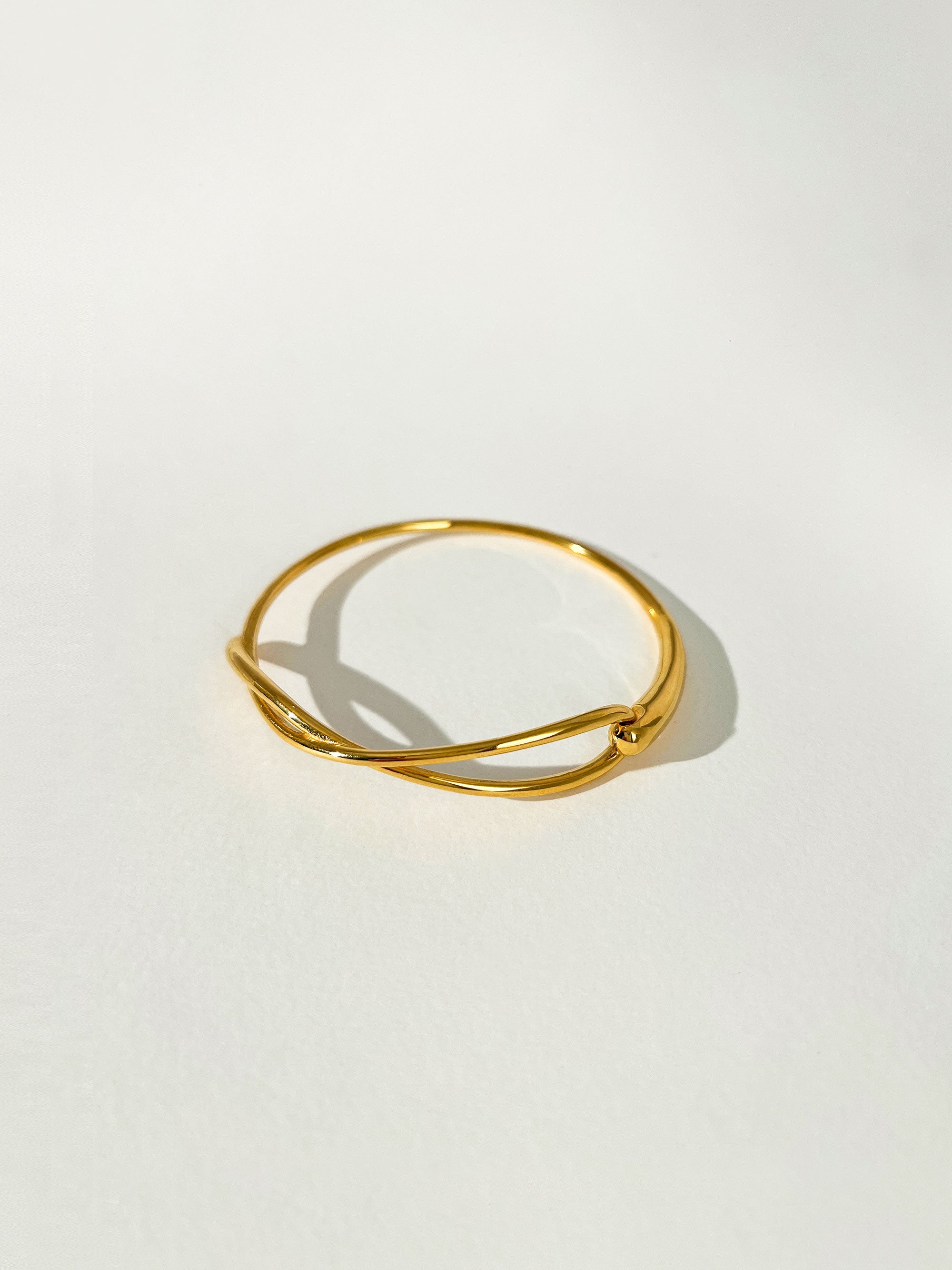 Cut-Out Twist Bangle Gold | OSKER Jewellery Online